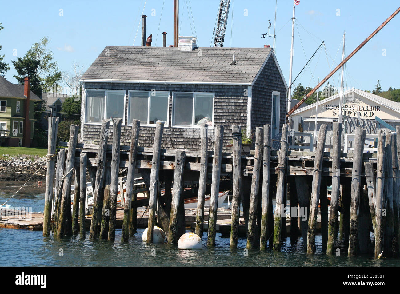 Water side shack on the wharf Stock Photo - Alamy