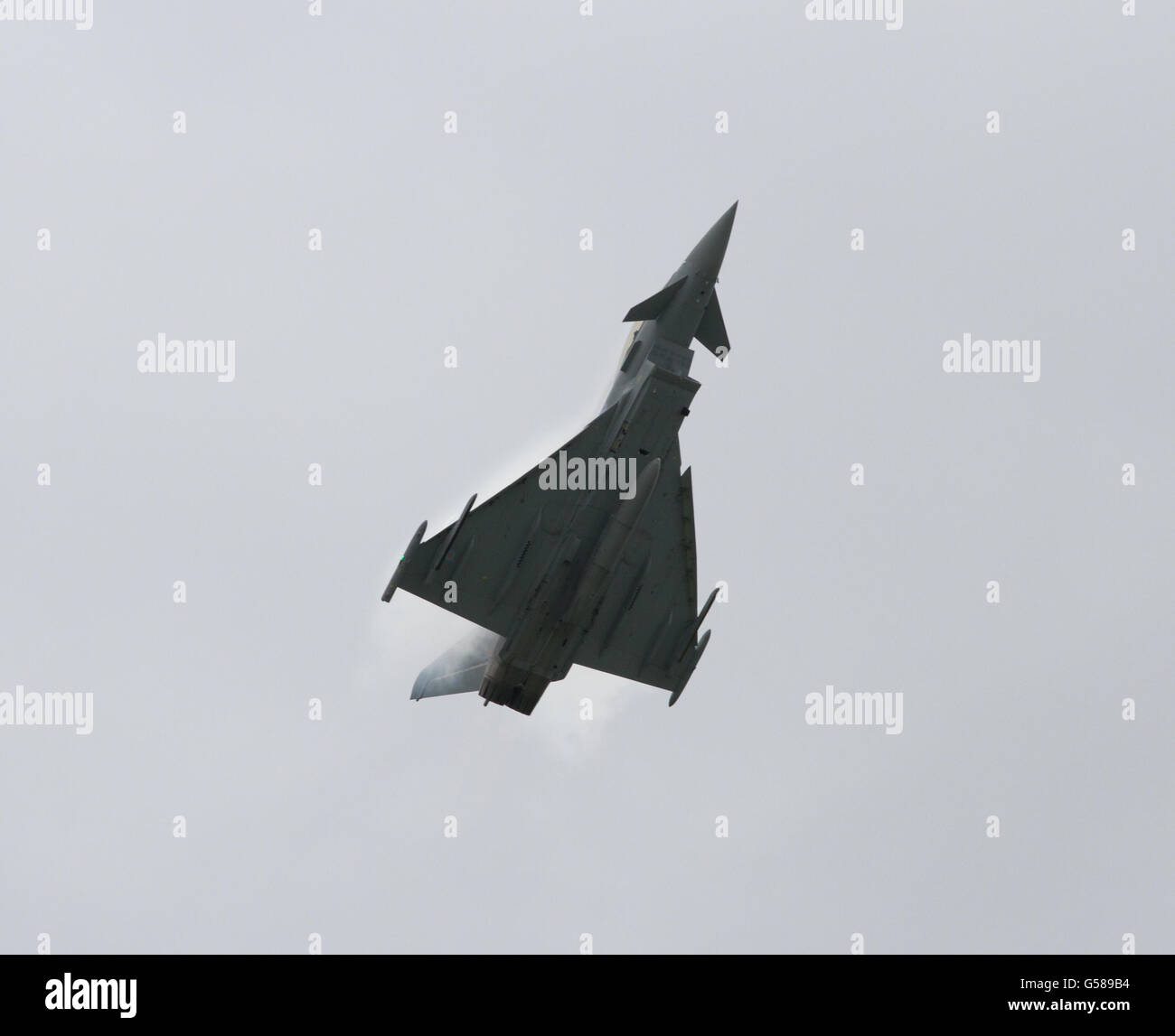 Eurofighter Typhoon display at RAF Cosford Air Show. Trails visible as ...