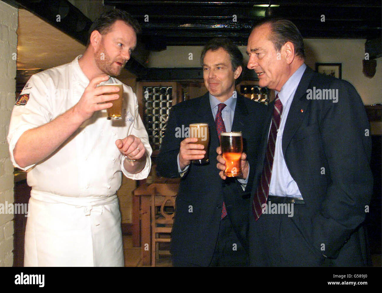 Chef Andrew Brown (L) with French President Jacques Chirac (R) and ...