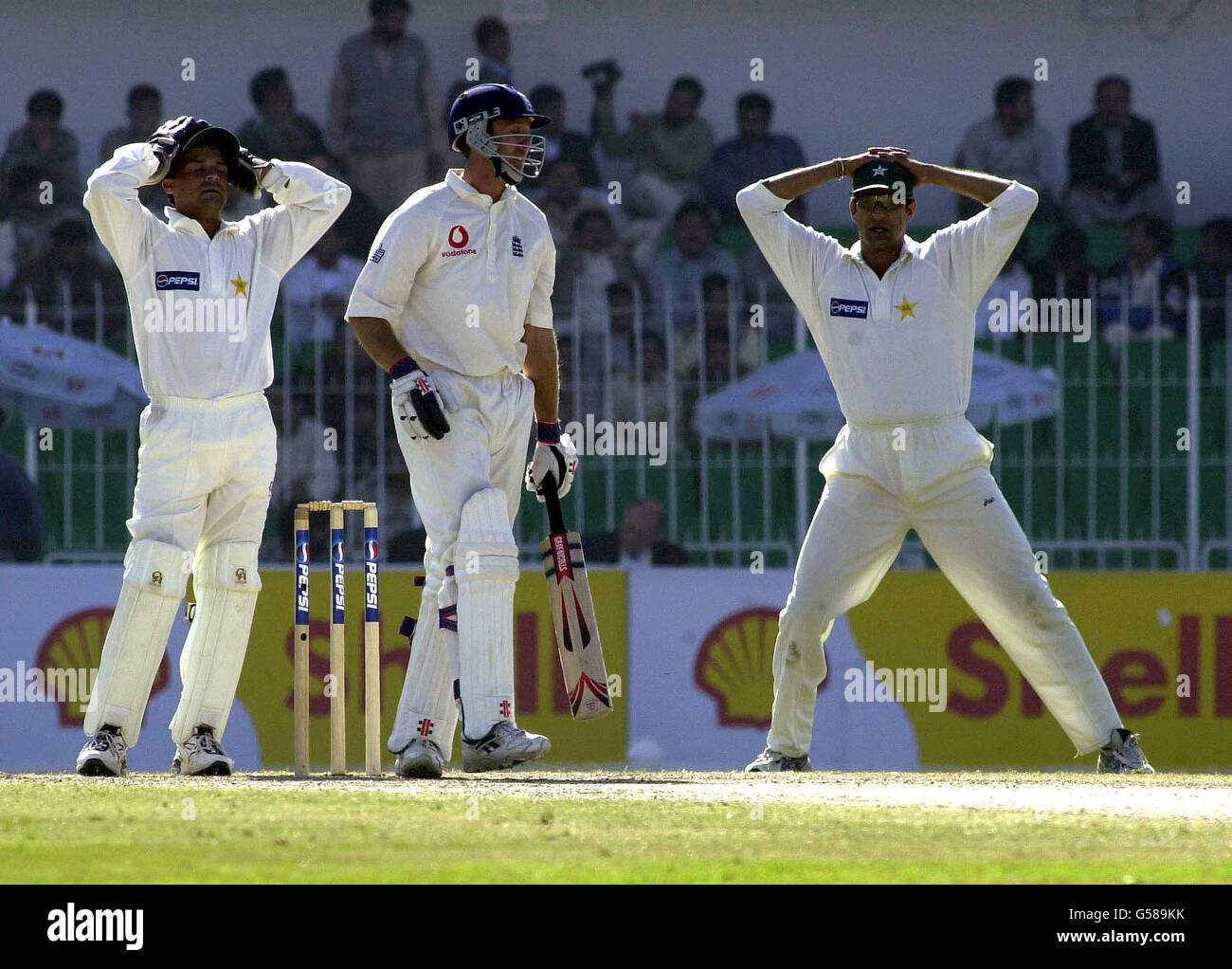 Pakistan's Moin Khan (left) and Wasim Akram (right) and England's Ian ...