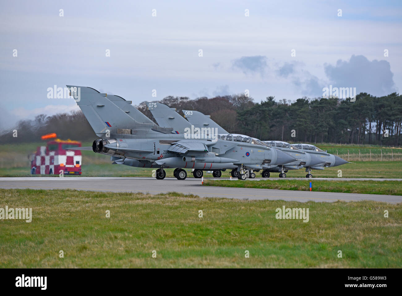 Lined up and ready for take off, four RAF GR4 Tornadoes at Lossiemouth ...