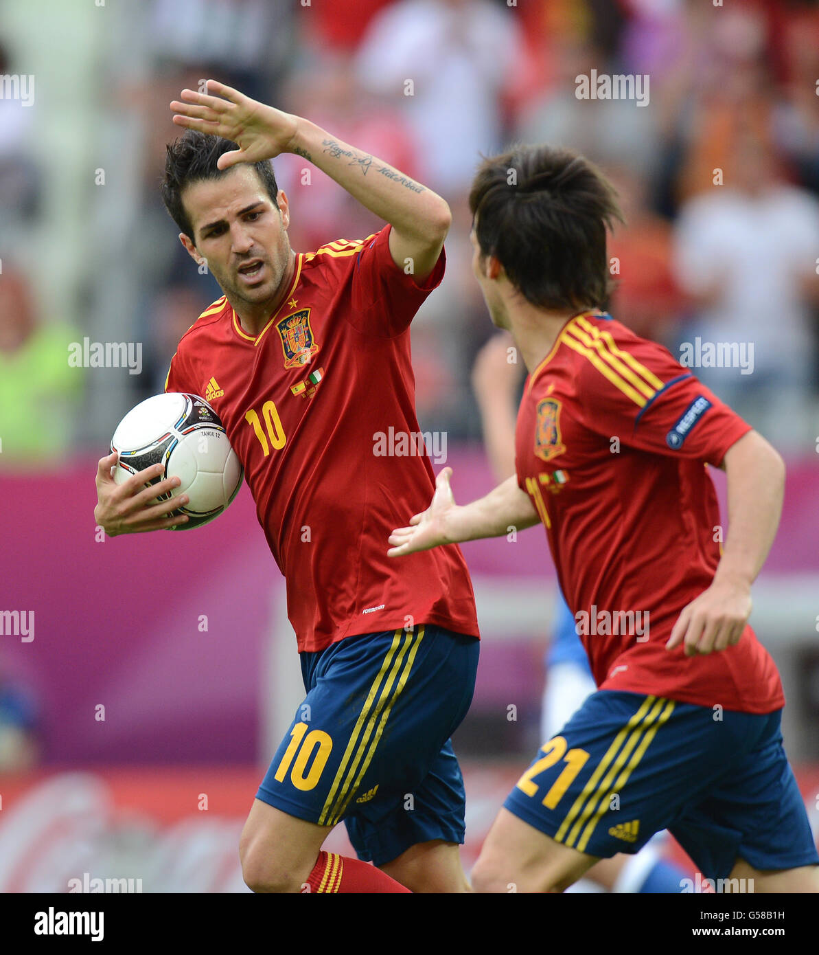 Spains cesc fabregas celebrates scoring hi-res stock photography and ...
