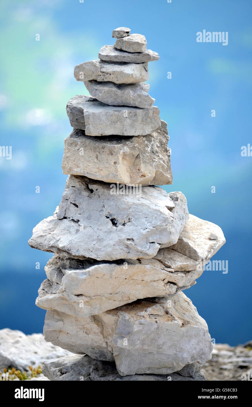 Pyramid on mountainside stability equilibrium hi-res stock photography ...