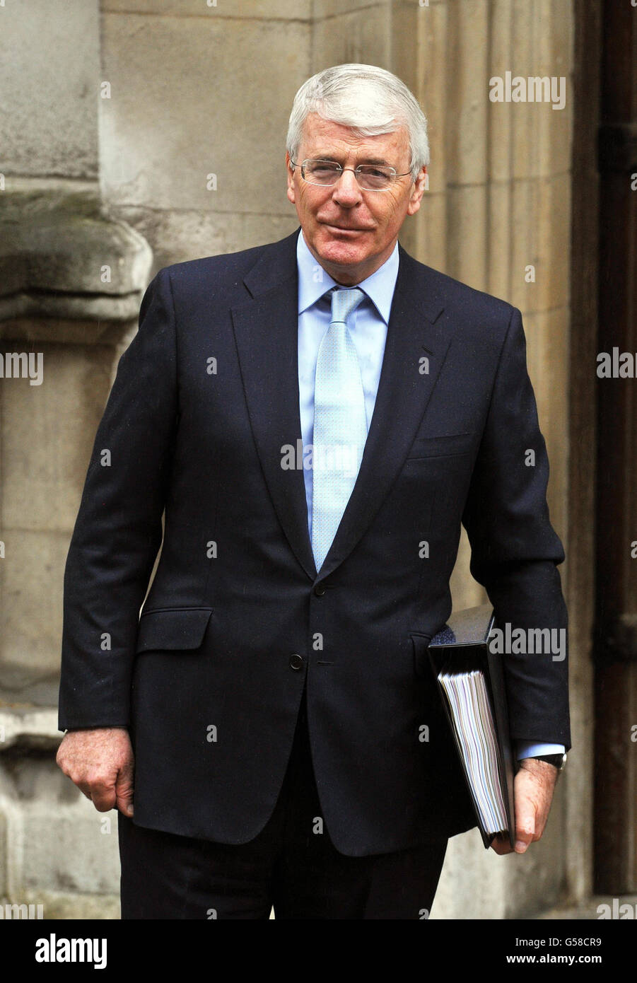 Former Prime Minister Sir John Major arrives at the Royal Courts of ...