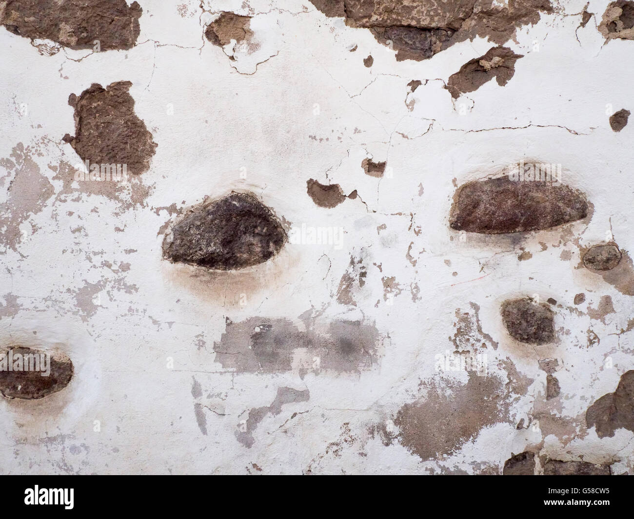 Background of old damaged stone wall texture Stock Photo - Alamy