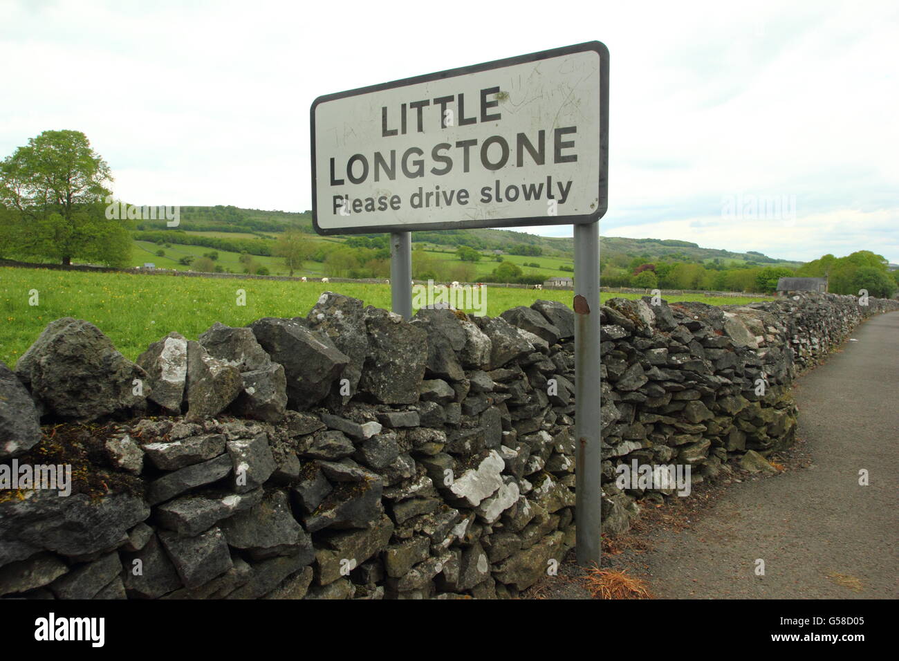 A village sign at the entrance to Little Longstone village, Derbyshire ...