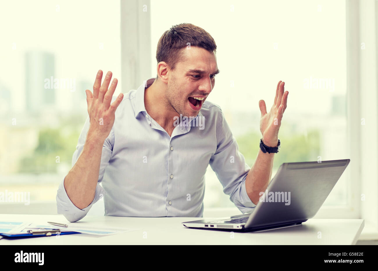 Angry furious male office worker hi-res stock photography and images ...