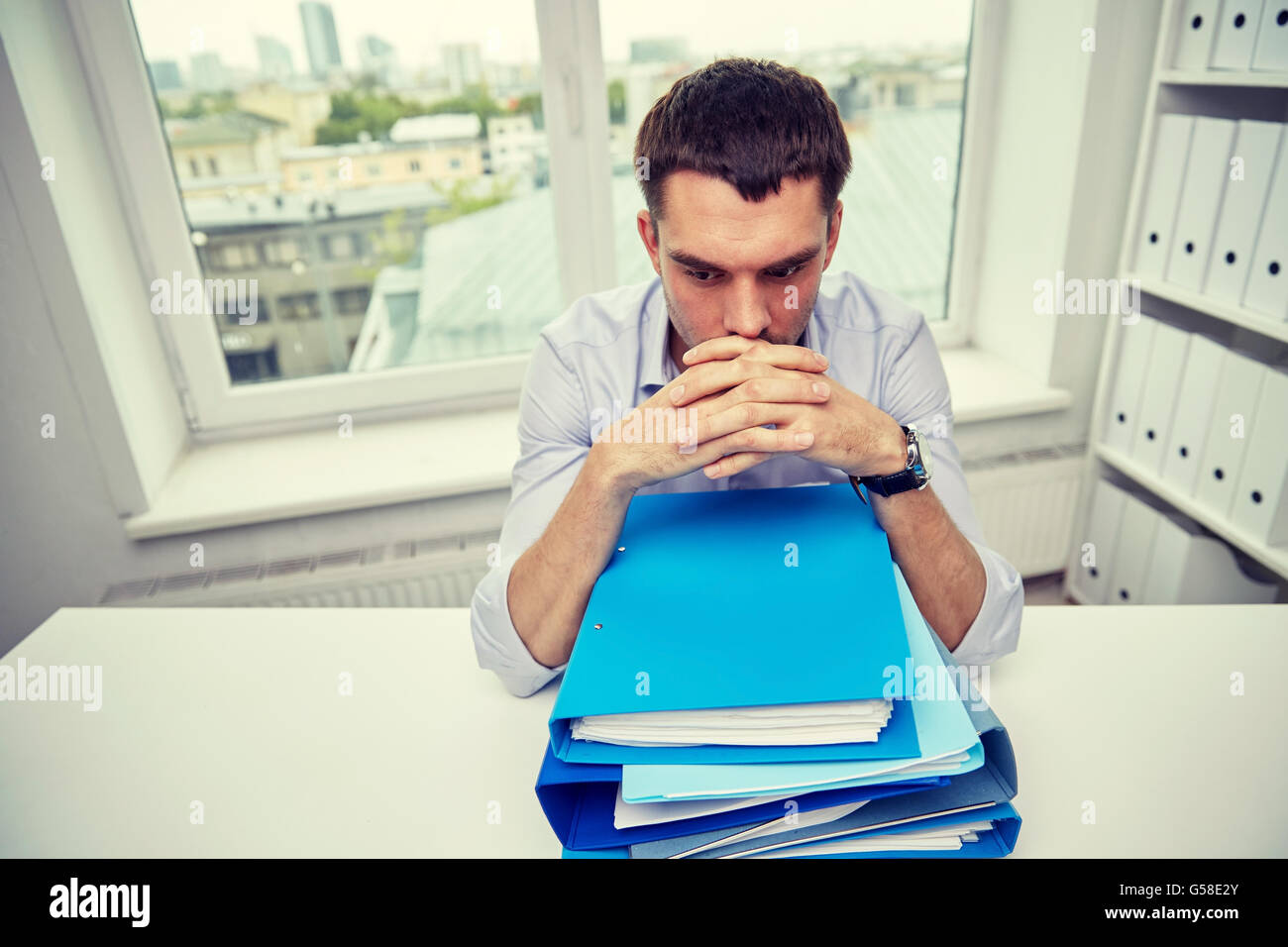 businessman taking papers from secretary in office Stock Photo - Alamy
