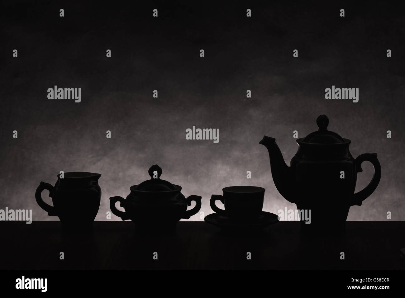 Dark silhouettes of ware for coffee on a gradient non-uniform ...