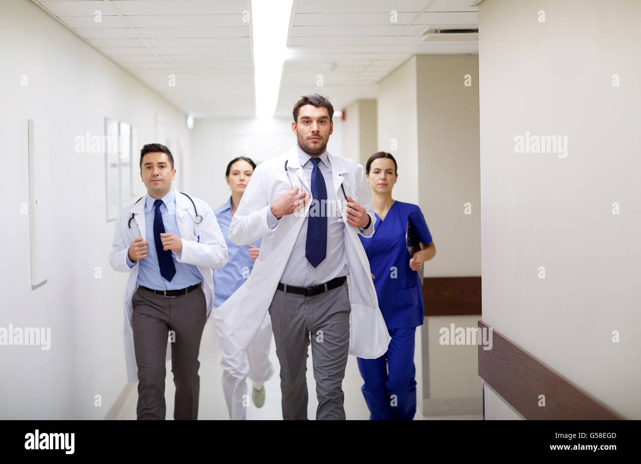 group of medics walking along hospital Stock Photo - Alamy
