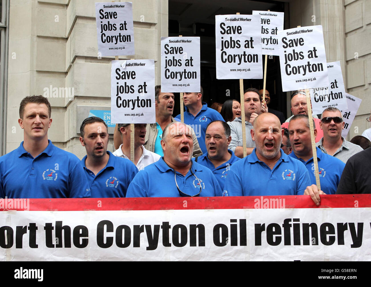 Workers from the Coryton oil refinery in Essex protest outside the ...