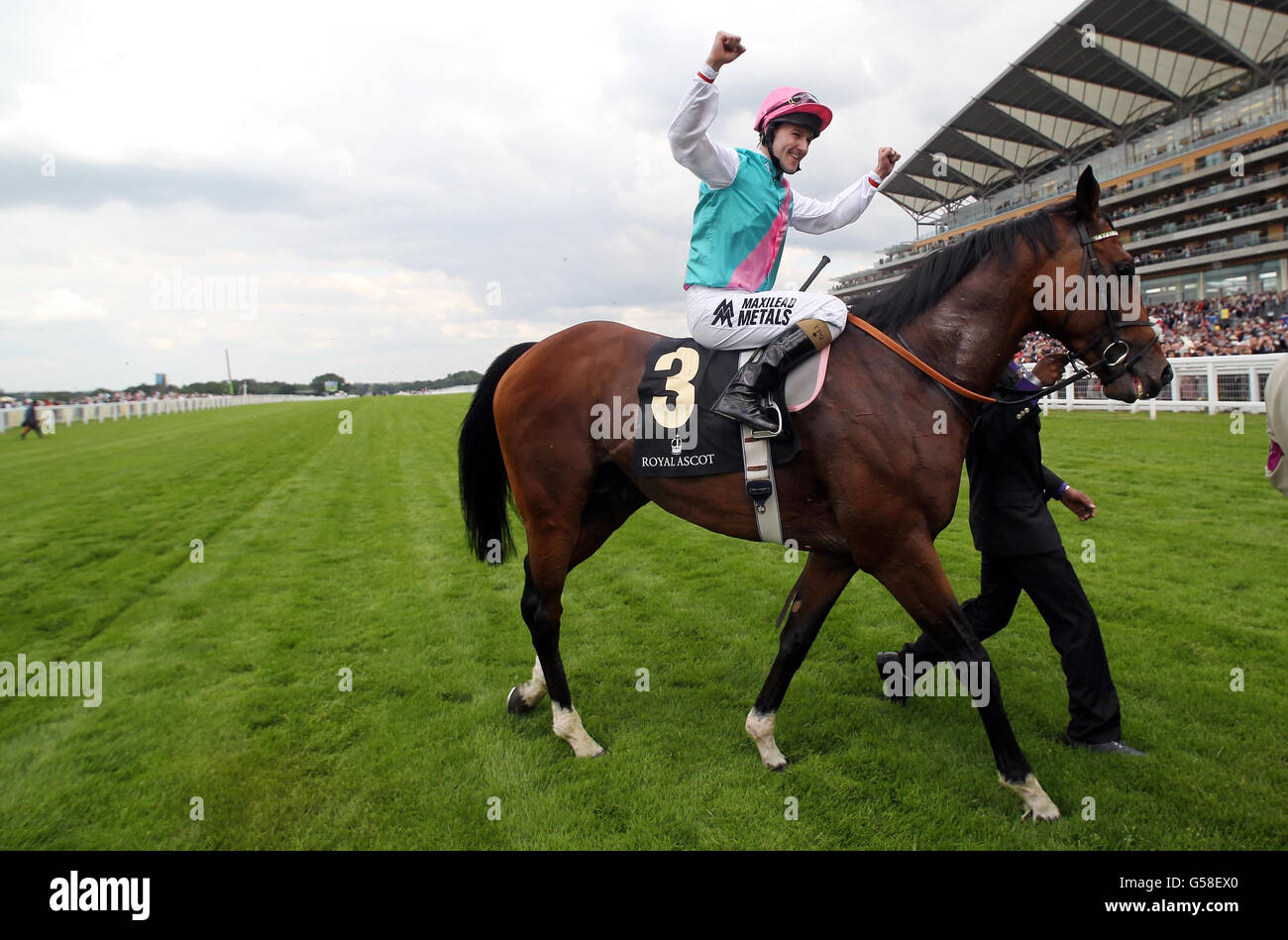 Tom Queally celebrates his victory on Frankel in the Queen Anne Stakes ...