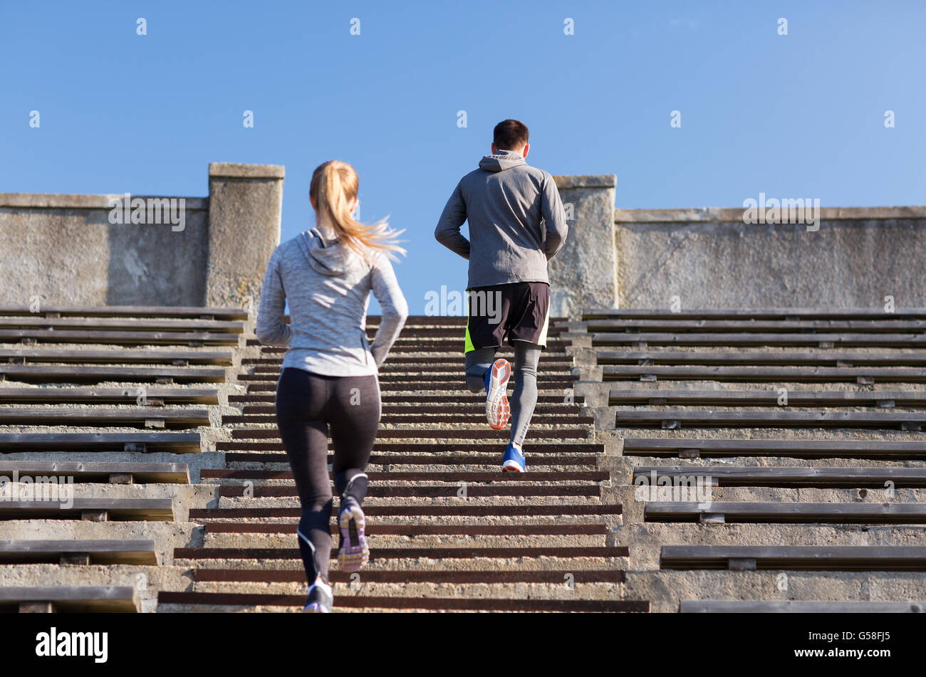 Running up stairs hi-res stock photography and images - Alamy