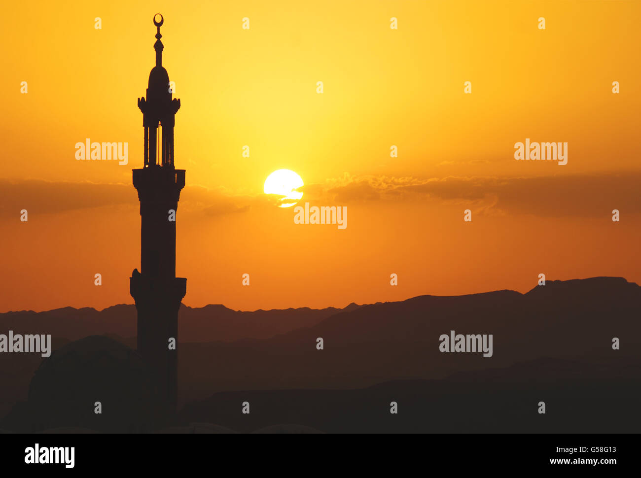 sunset over mosque in egypt town of el quesir Stock Photo - Alamy