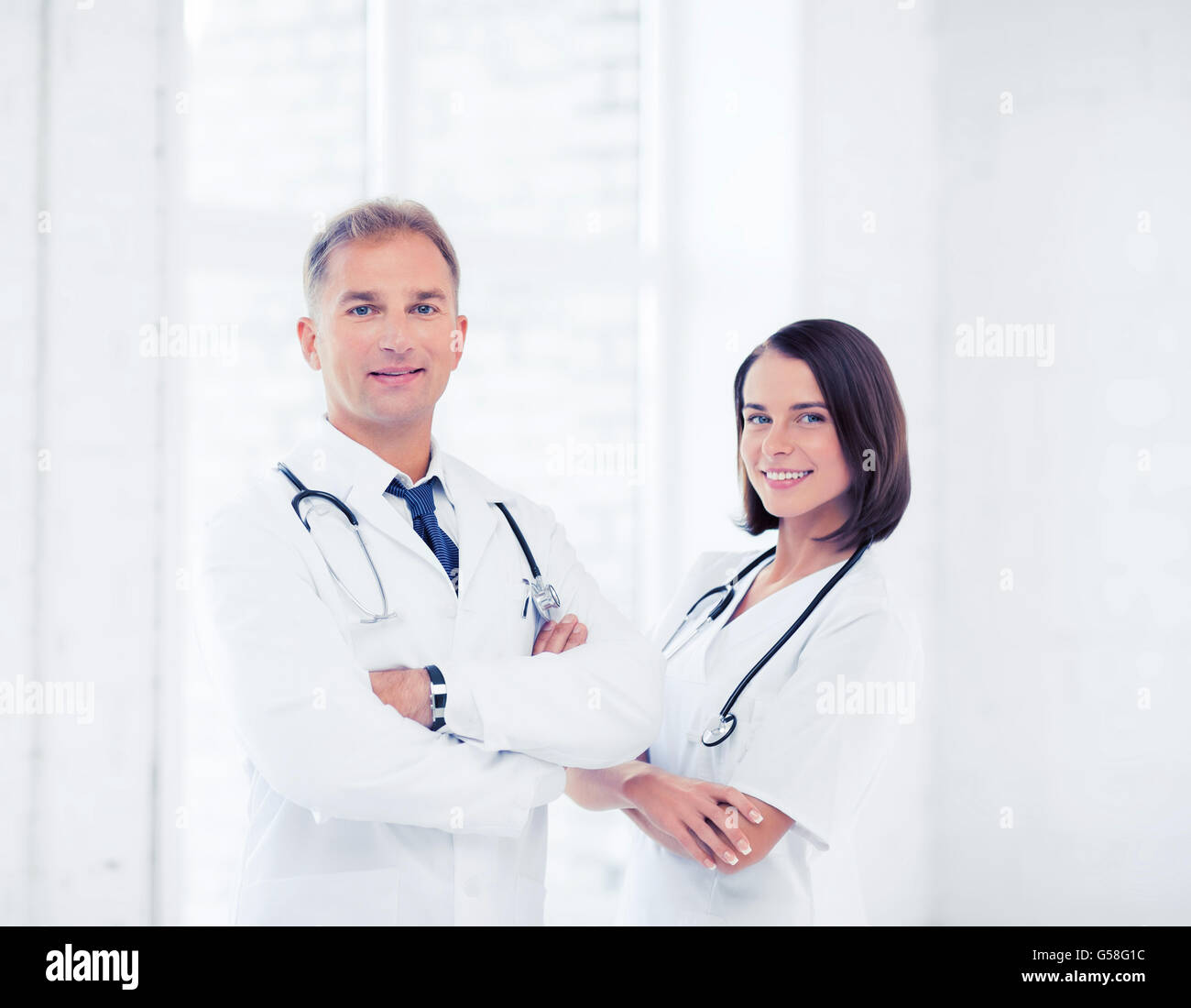 two doctors with stethoscopes Stock Photo - Alamy