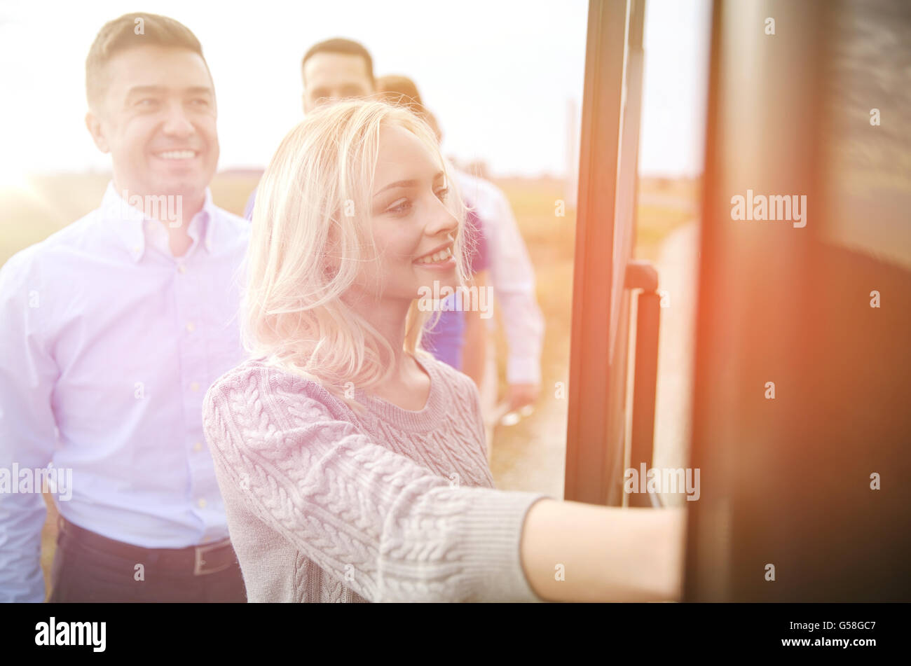 group of happy passengers boarding travel bus Stock Photo - Alamy