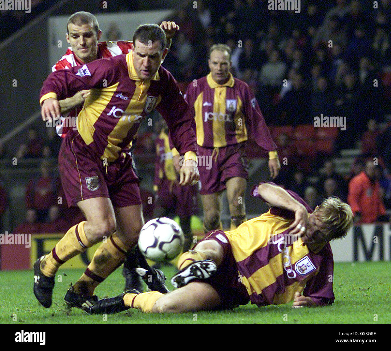 Sport football action tackling alex rae hi-res stock photography and ...
