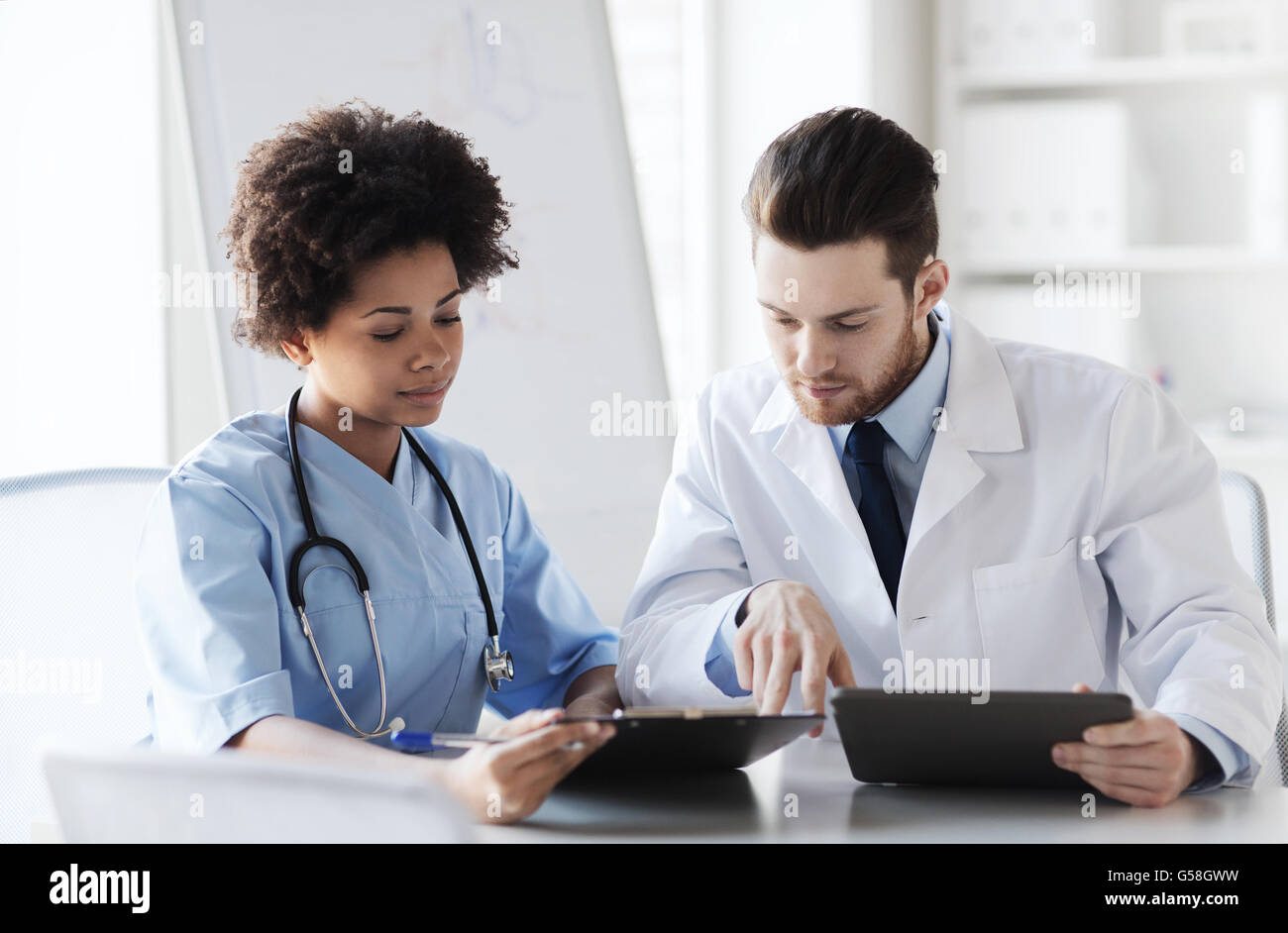 two doctors meeting at hospital office Stock Photo - Alamy