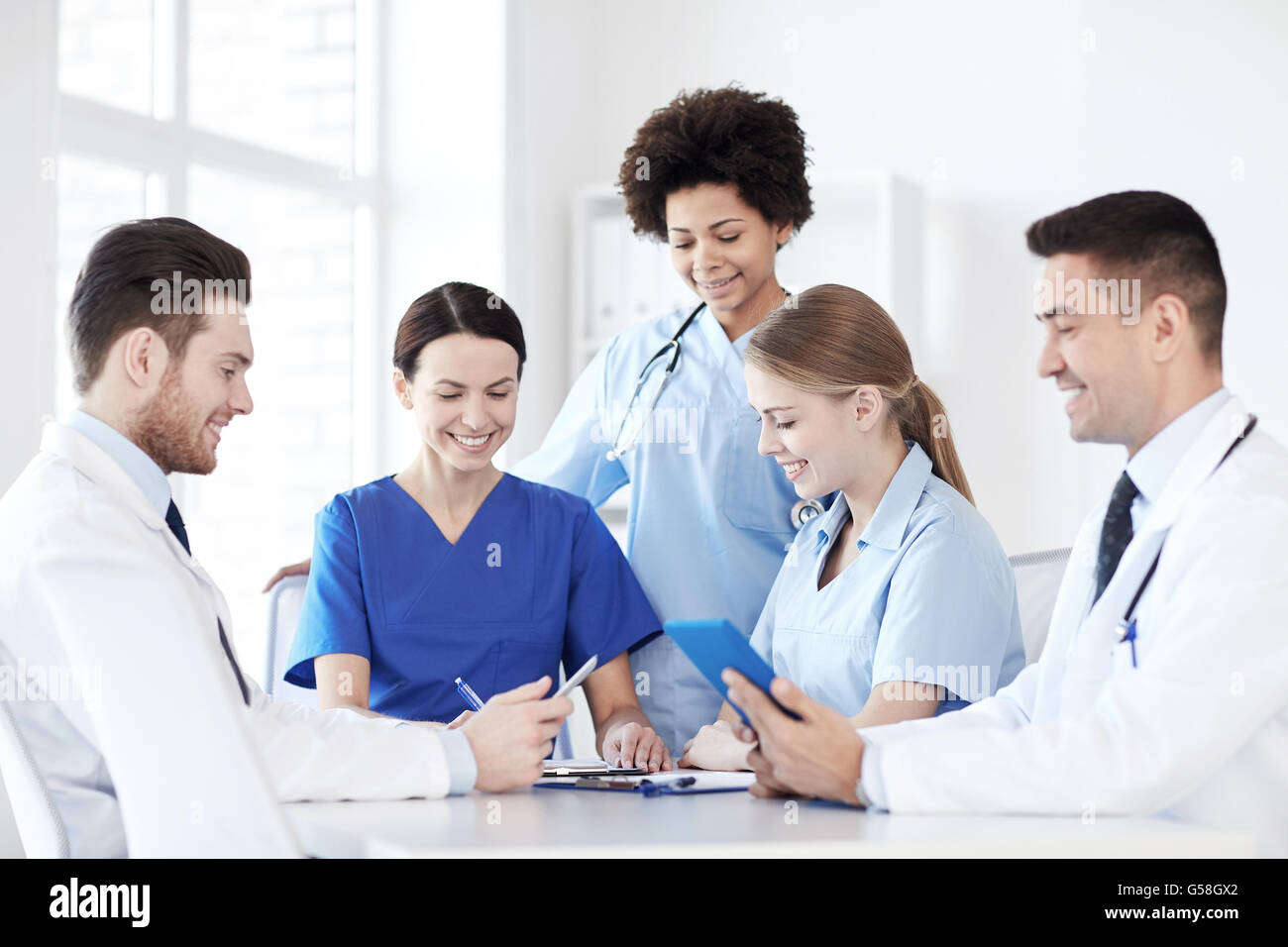 group of happy doctors meeting at hospital office Stock Photo - Alamy