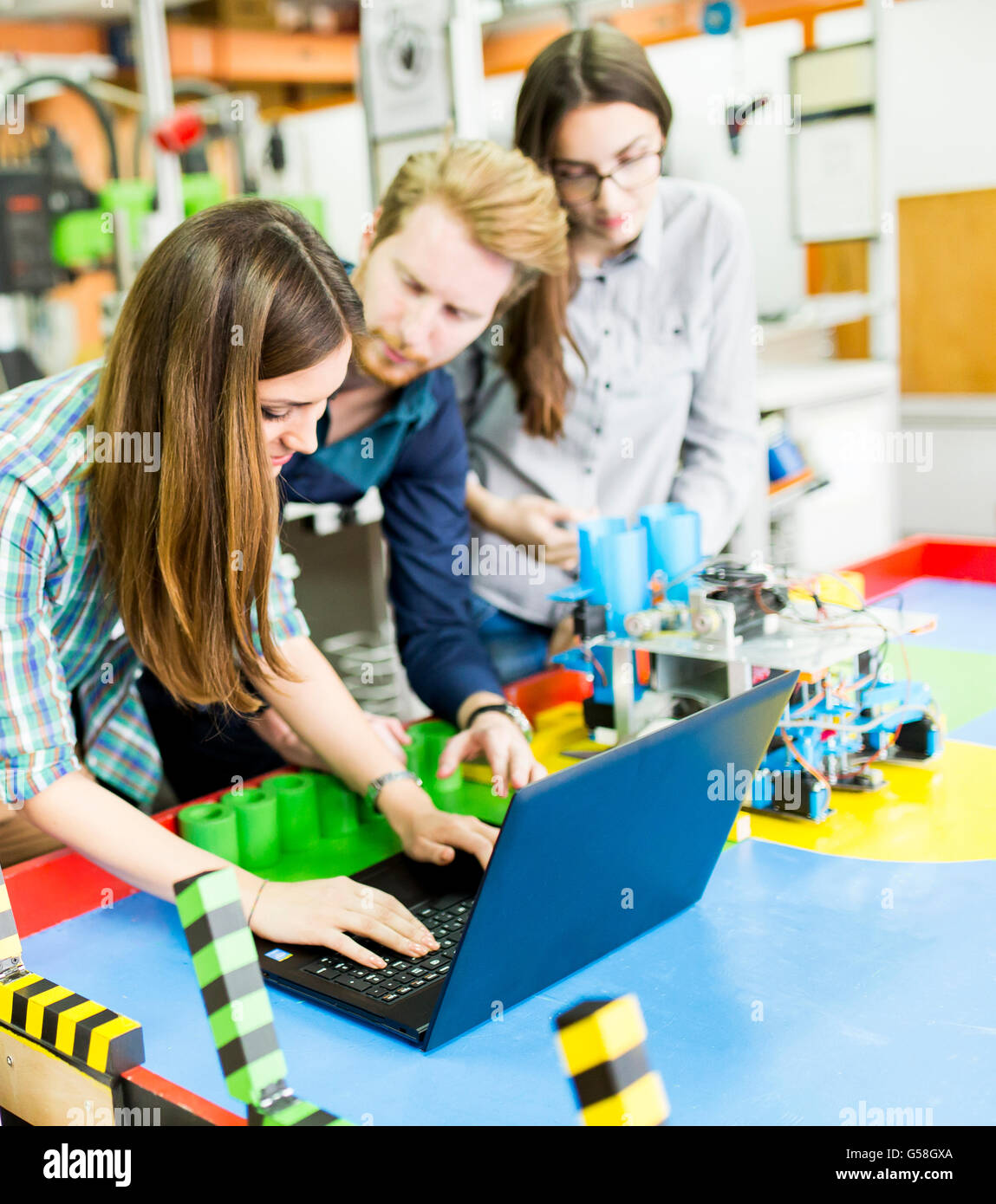 Young people in the robotics classroom Stock Photo - Alamy