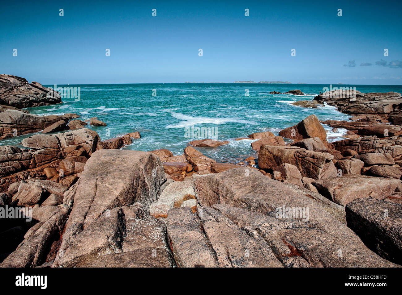 Beach and Stones at the pink Granite Coast in the Departement Cotes d ...