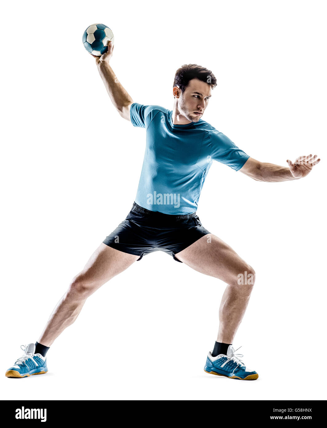 one young man handball player in studio on isolated white background ...