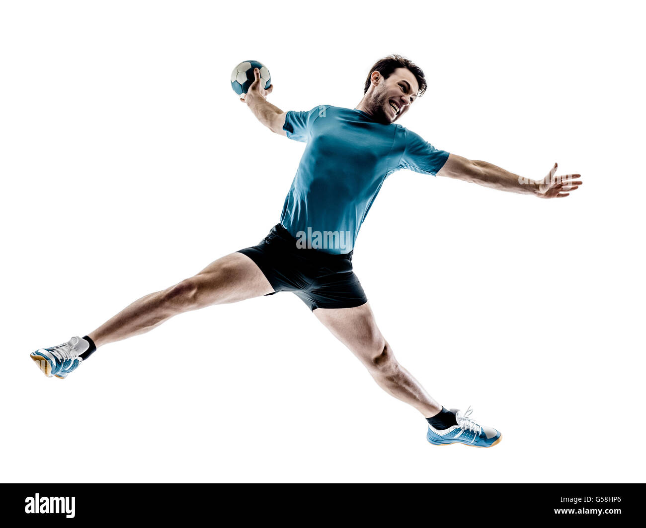 one young man handball player in studio on isolated white background ...
