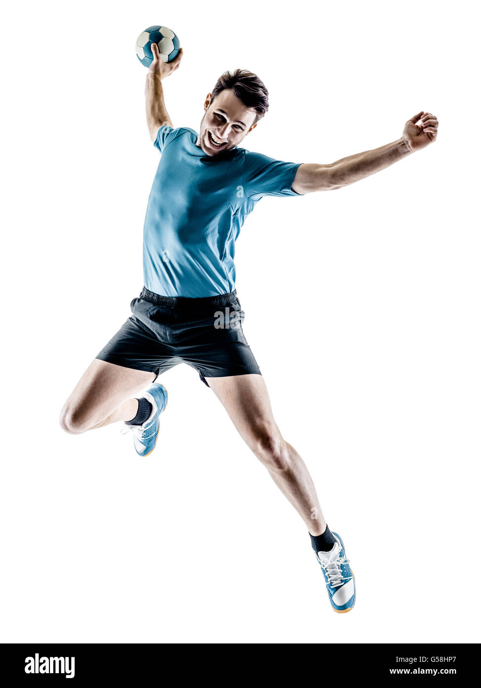 one young man handball player in studio on isolated white background ...