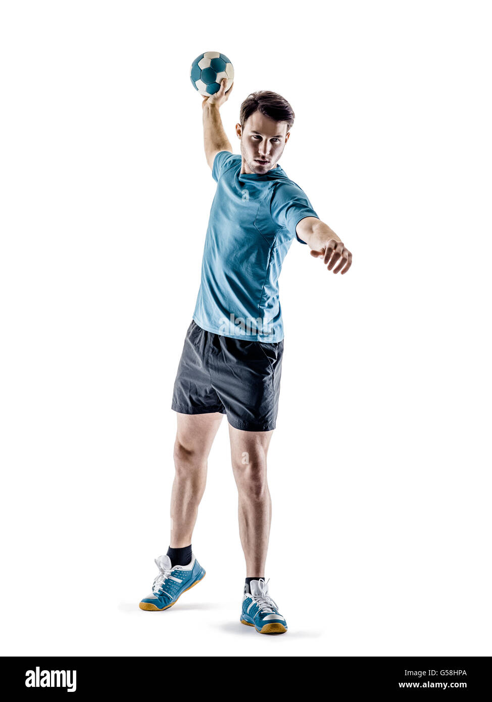 one young man handball player in studio on isolated white background ...