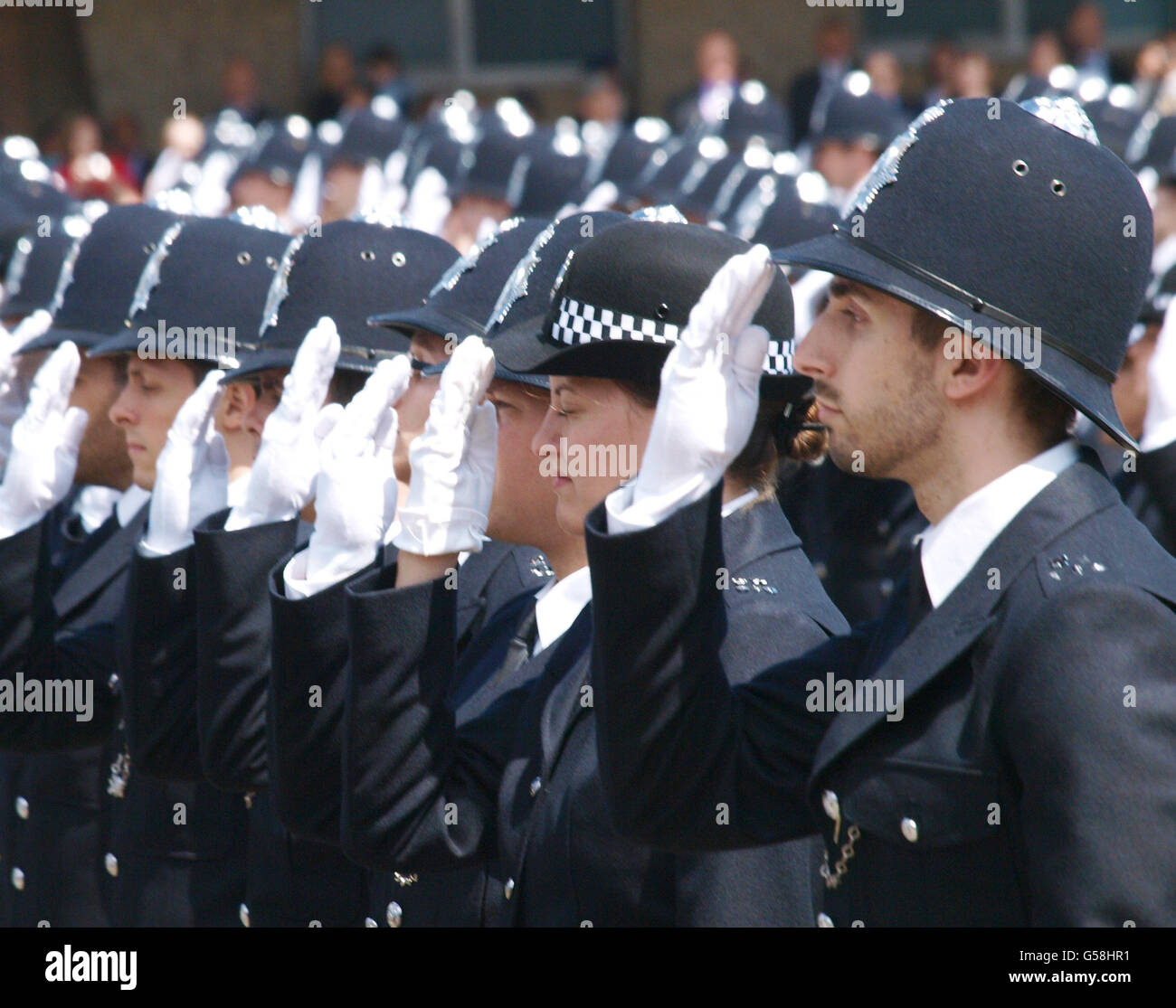 The 567 graduates take the salute during the passing out ceremony for ...