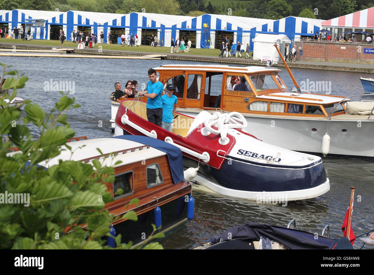 Three rowing boats on hi-res stock photography and images - Alamy