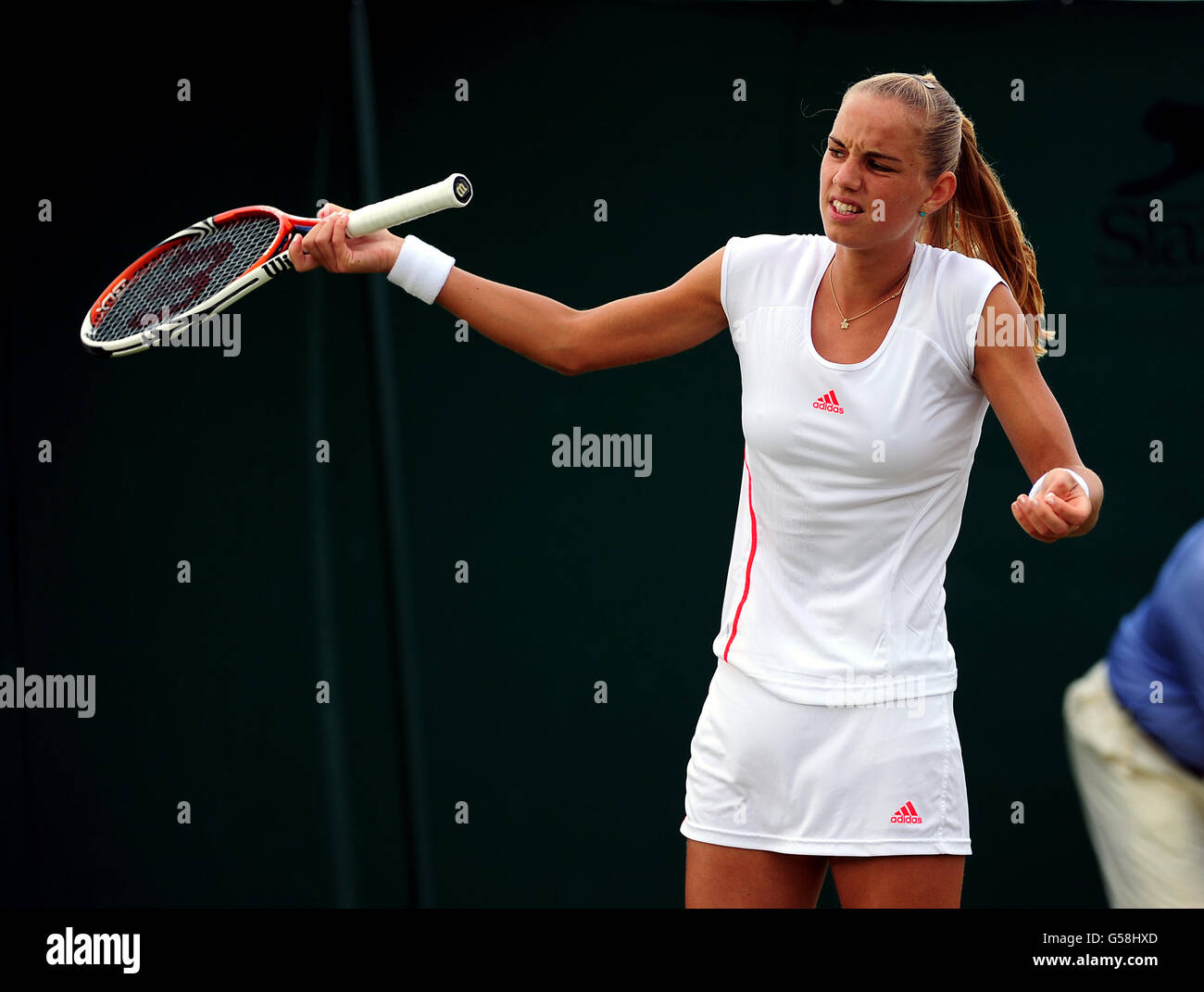 Netherland's Arantxa Rus shows her frustrations during her match against China's Shuai Peng ...