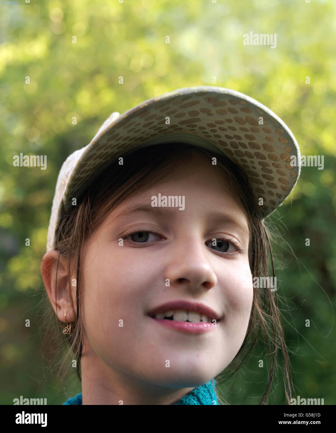 Girl with a curious look Stock Photo - Alamy