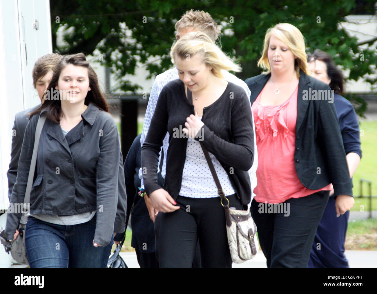 Members of 13-year-old cyclist Amy Hofmeister's family arrive at ...