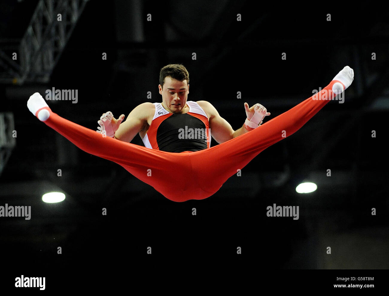 Earls Gymnastics Club's Kristian Thomas performing on the high bar ...