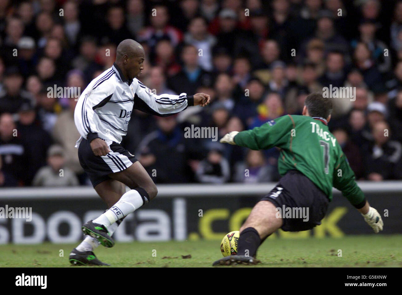 Football kicking ball scoring action diving hi-res stock photography ...