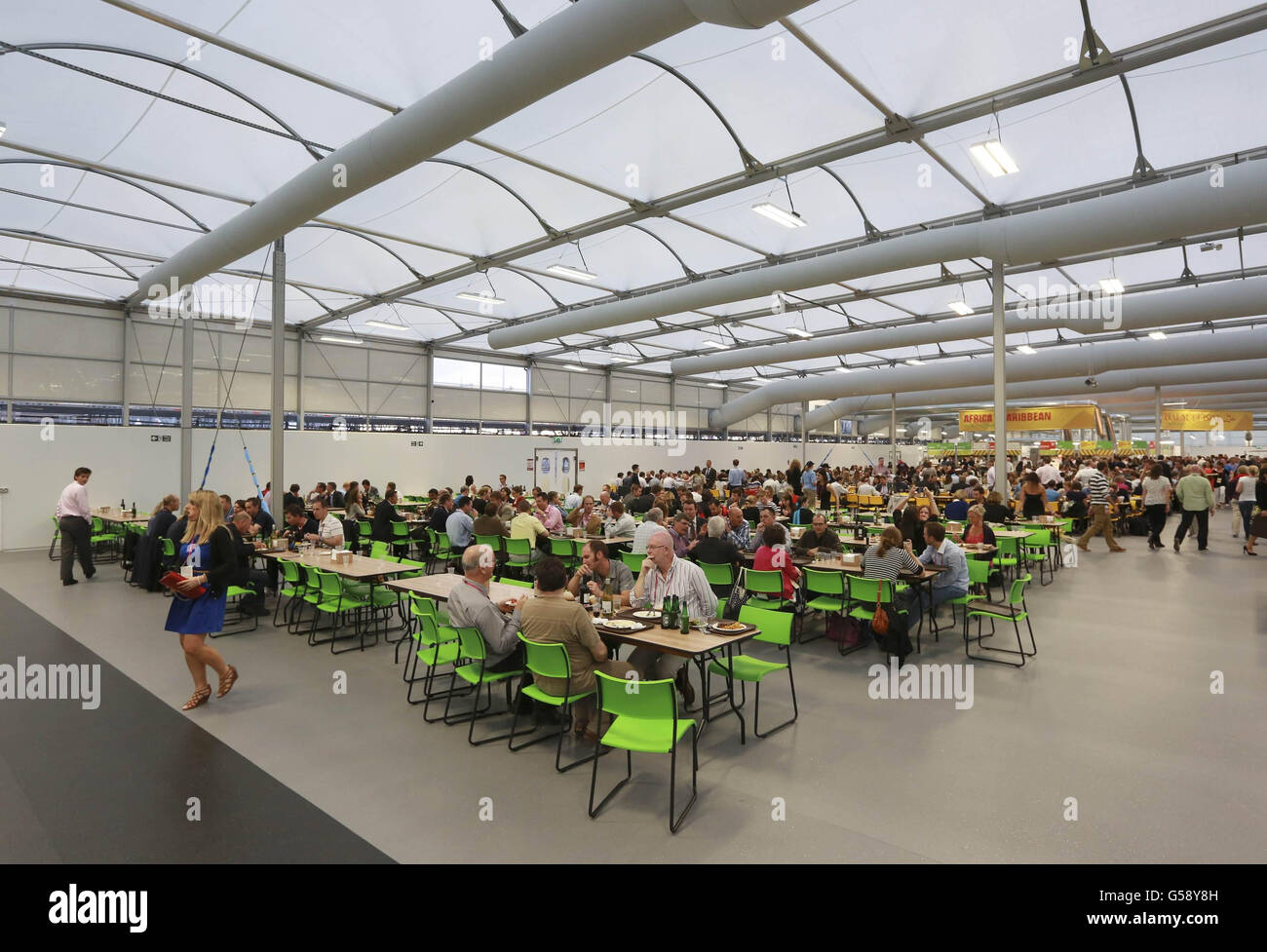 Guests test the 5,000 capacity Olympic Village dining room, a temporary ...