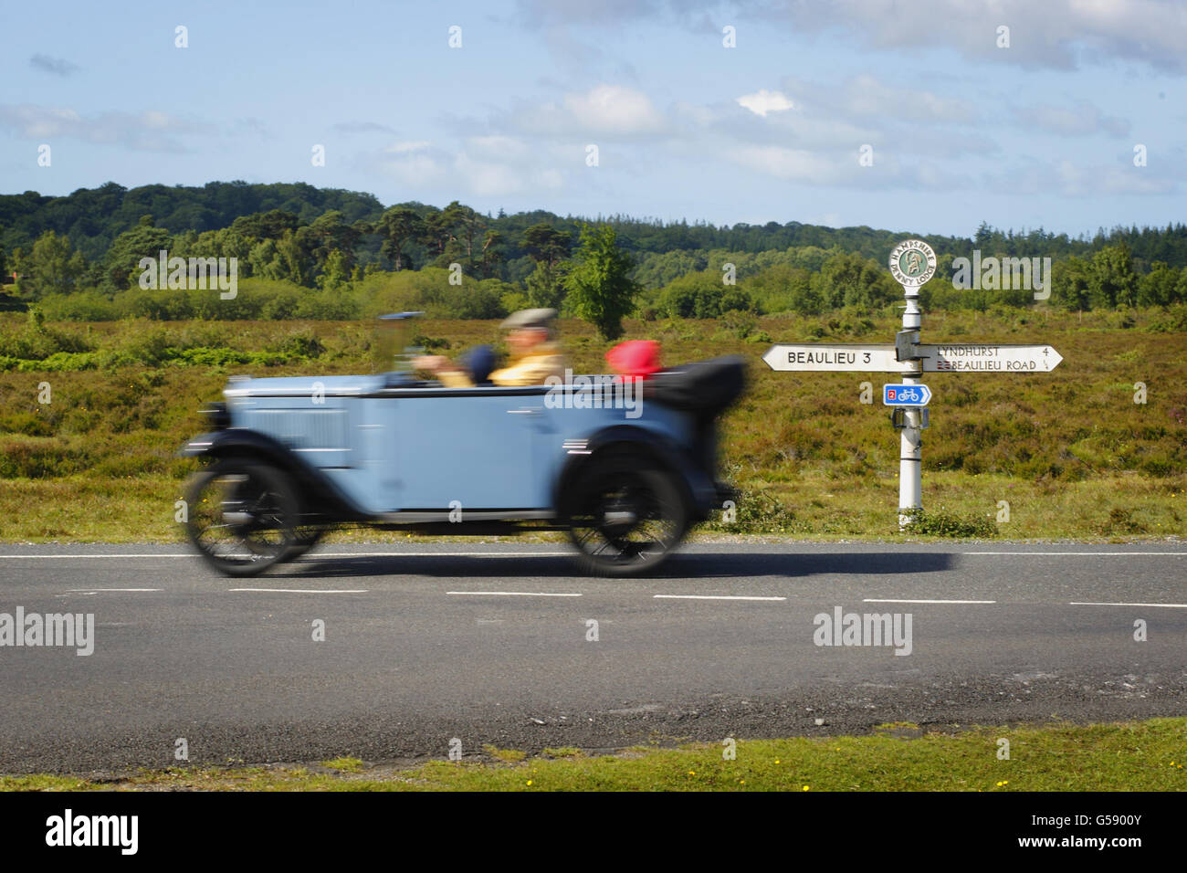 A car heads through the New Forest to the 50th Austin Seven rally at ...
