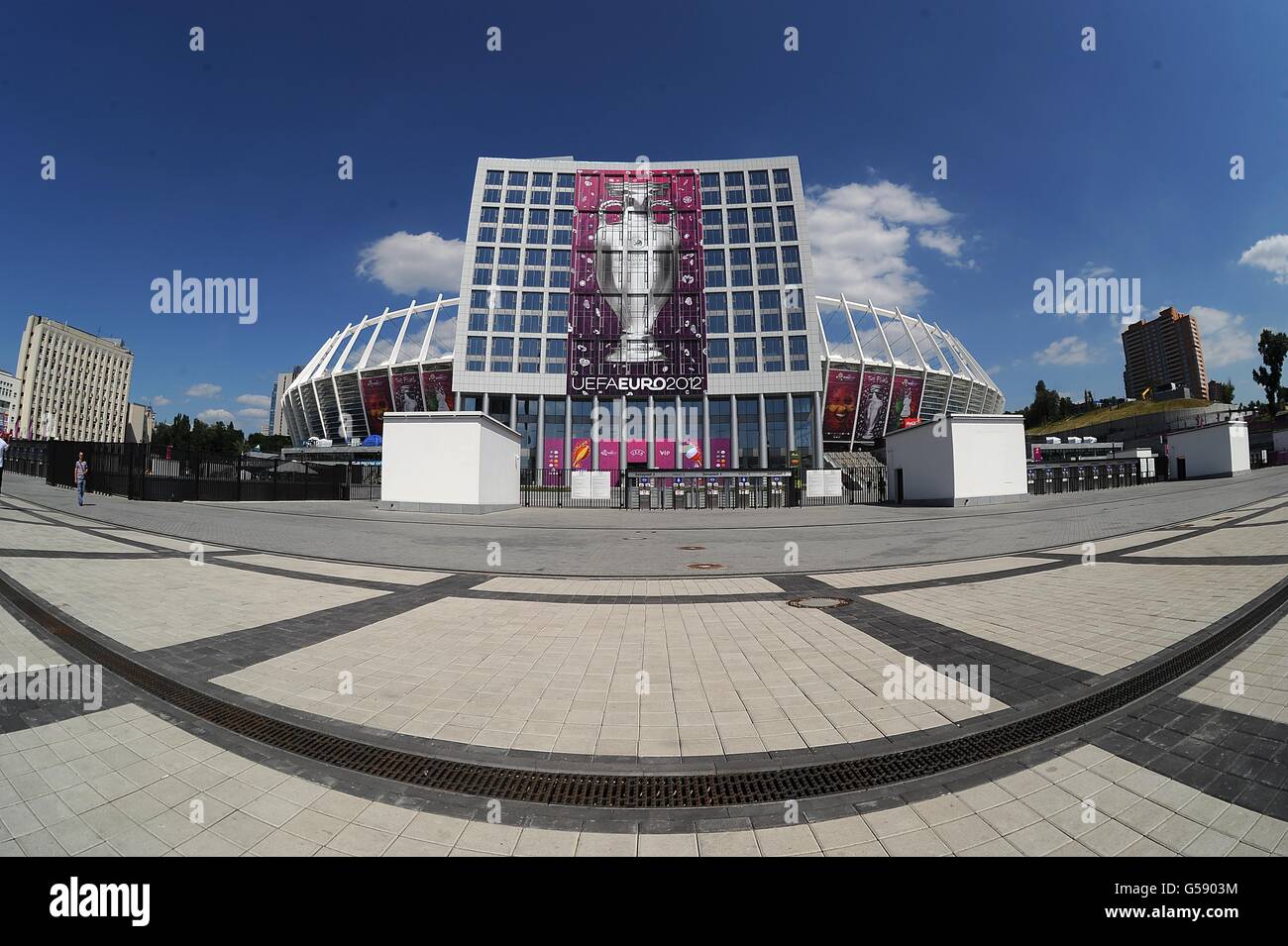 A general view of the Olympic Stadium as fans mill around the ground ...