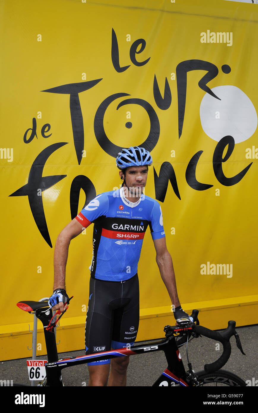 Cycling - 2012 Tour de France - Stage One. David Millar stands by the ...