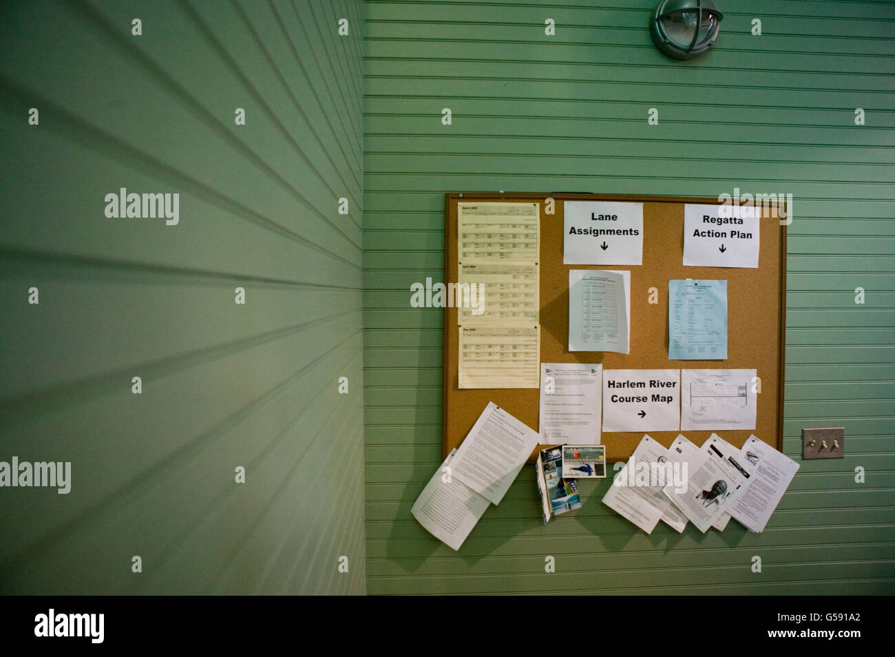 Information is pinned on a cork board in the Peter Jay Sharp boathouse ...