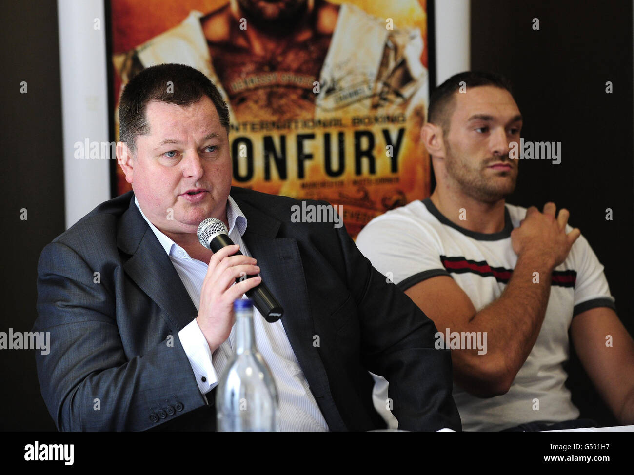 Promoter Mick Hennessy (left) and Tyson Fury during the press ...