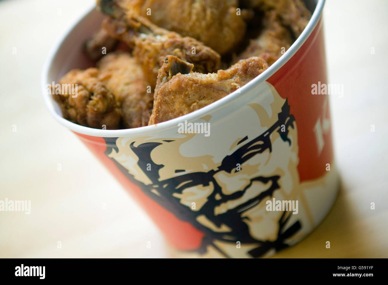 In this illustration photo a Kentucky Fried Chicken bucket of chicken ...