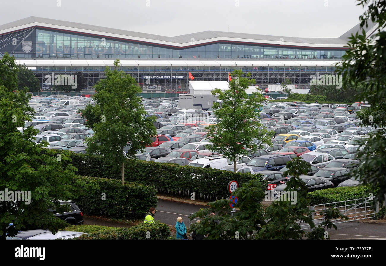 Cars parked bumper to bumper in a car park at Silverstone before the ...