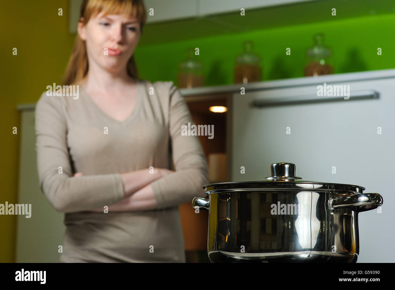 Annoyed woman kitchen hi-res stock photography and images - Alamy