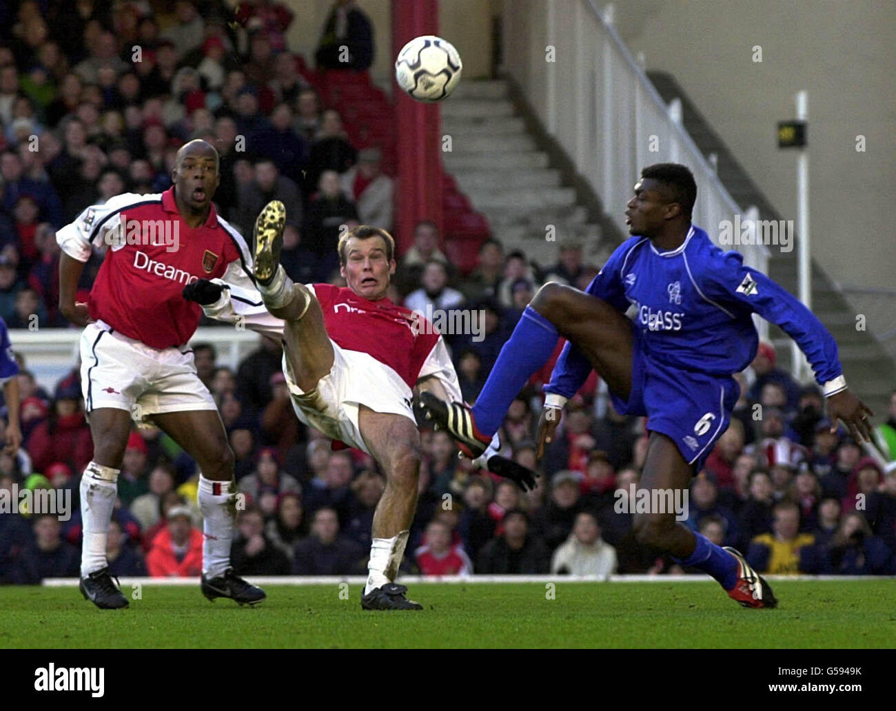 Football leg raised kicking ball action hi-res stock photography and ...