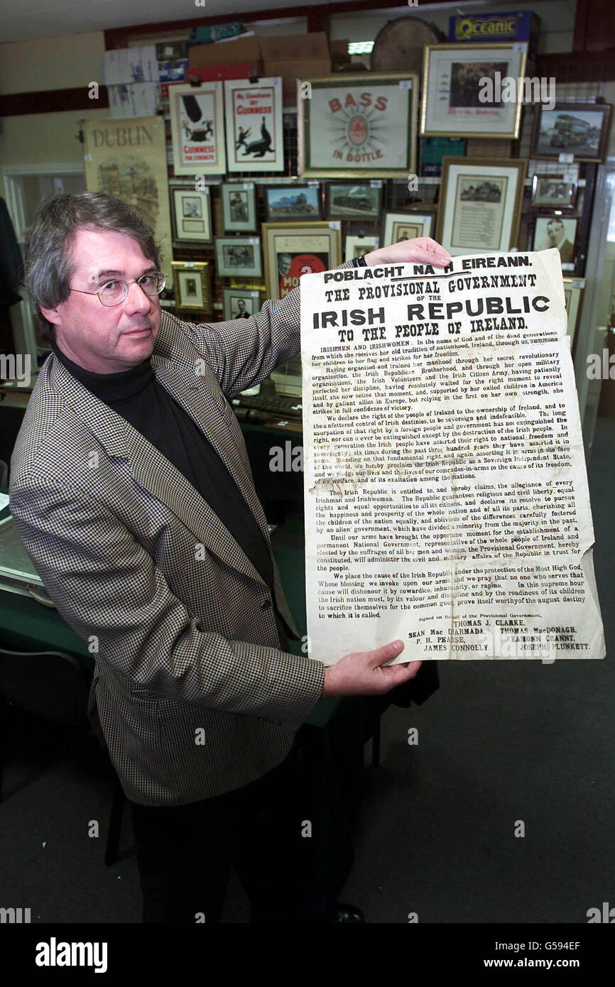 Auctioneer Ian Whyte holds a copy of the original Declaration of ...