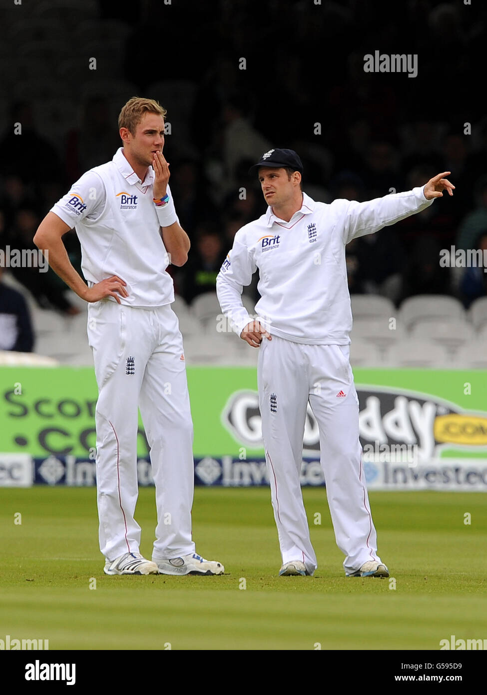 England's Stuart Broad (left) discusses his field placing with captain ...
