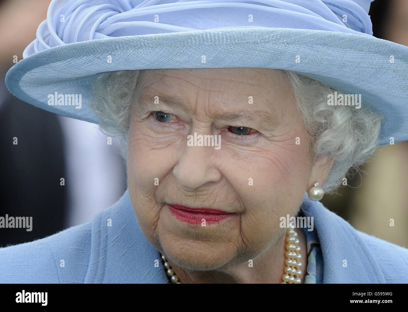 Queen Elizabeth II with a bloodshot left eye at the Cartier Queen's Cup ...