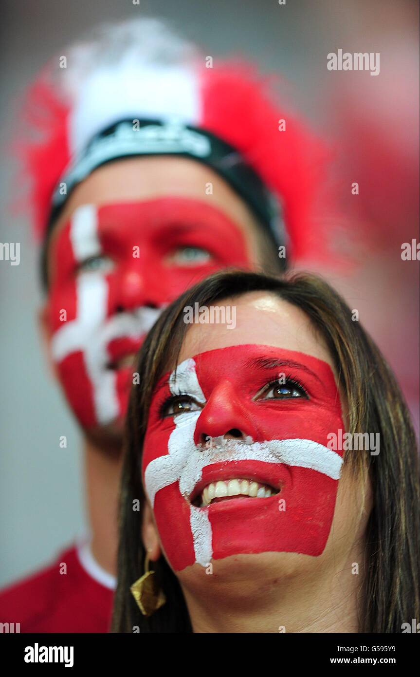 Denmark fans show support for their team in the stands Stock Photo - Alamy